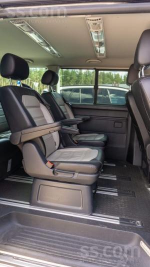 White Volkswagen Multivan 2017 in Riga, with an engine capacity of 2.00 L and mileage of 166 thousand km for 21990 €, photo 31 on AUTOMOTO.COM.LV