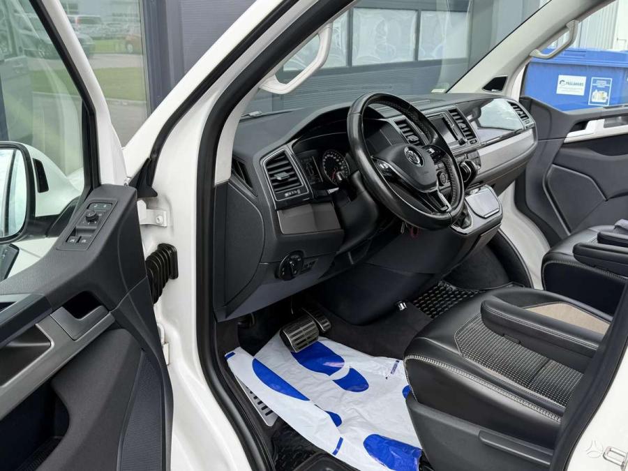 White Volkswagen Multivan 2018 in Jonava, with an engine capacity of 1.97 L and mileage of 290 thousand km for 25990 €, photo 17 on AUTOMOTO.COM.LV