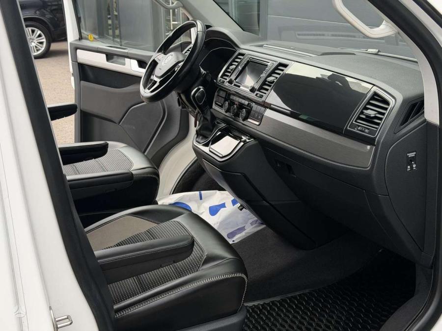 White Volkswagen Multivan 2018 in Jonava, with an engine capacity of 1.97 L and mileage of 290 thousand km for 25990 €, photo 18 on AUTOMOTO.COM.LV