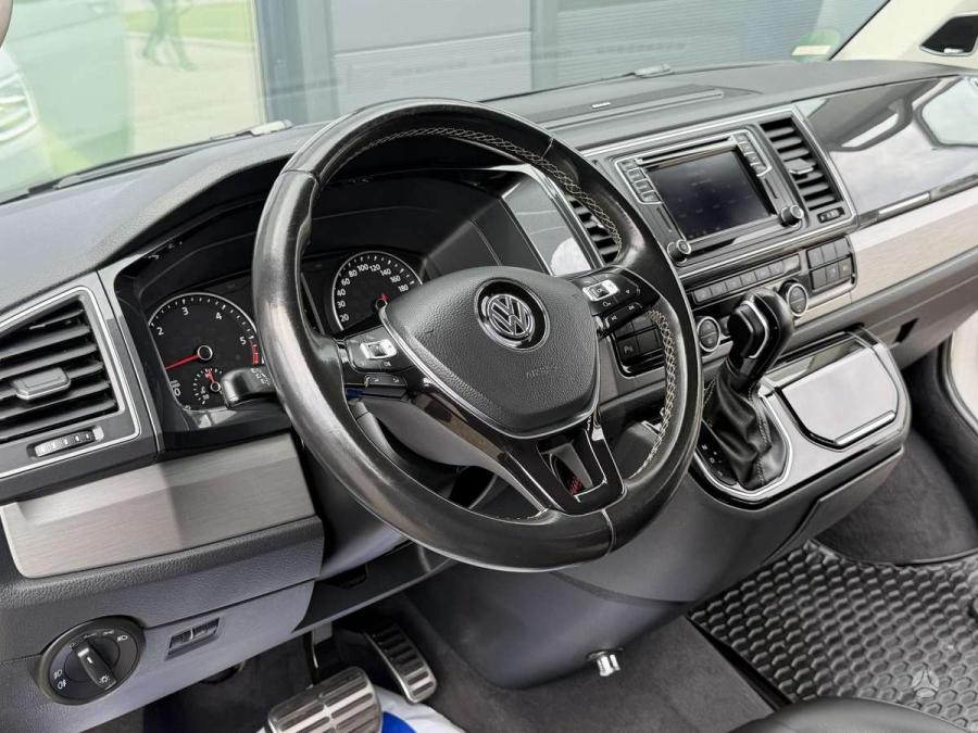 White Volkswagen Multivan 2018 in Jonava, with an engine capacity of 1.97 L and mileage of 290 thousand km for 25990 €, photo 21 on AUTOMOTO.COM.LV