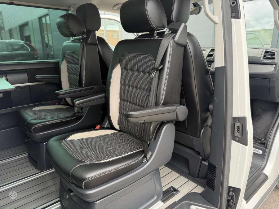 White Volkswagen Multivan 2018 in Jonava, with an engine capacity of 1.97 L and mileage of 290 thousand km for 25990 €, photo 33 on AUTOMOTO.COM.LV