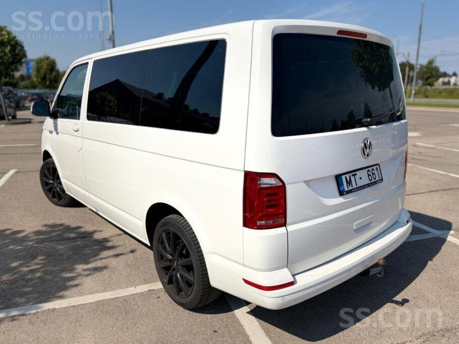 White Volkswagen Multivan 2018 in Riga, with an engine capacity of 2.00 L and mileage of 218 thousand km for 26950 €, photo 1 on AUTOMOTO.COM.LV