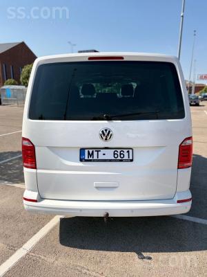 White Volkswagen Multivan 2018 in Riga, with an engine capacity of 2.00 L and mileage of 218 thousand km for 26950 €, photo 4 on AUTOMOTO.COM.LV