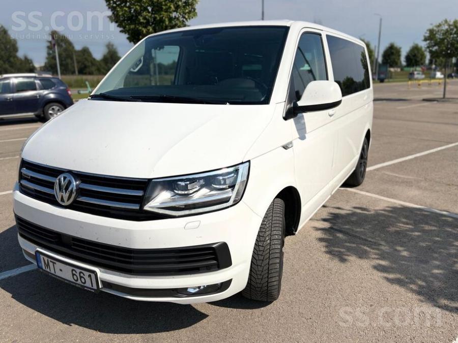 White Volkswagen Multivan 2018 in Riga, with an engine capacity of 2.00 L and mileage of 218 thousand km for 26950 €, photo 7 on AUTOMOTO.COM.LV