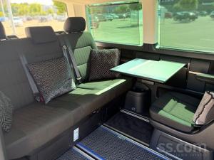 White Volkswagen Multivan 2018 in Riga, with an engine capacity of 2.00 L and mileage of 218 thousand km for 26950 €, photo 12 on AUTOMOTO.COM.LV