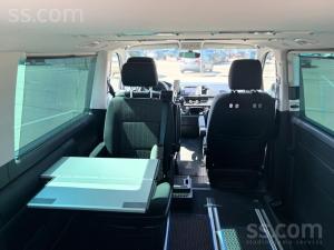 White Volkswagen Multivan 2018 in Riga, with an engine capacity of 2.00 L and mileage of 218 thousand km for 26950 €, photo 13 on AUTOMOTO.COM.LV