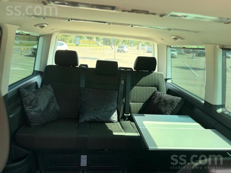 White Volkswagen Multivan 2018 in Riga, with an engine capacity of 2.00 L and mileage of 218 thousand km for 26950 €, photo 14 on AUTOMOTO.COM.LV