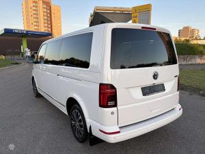 White Volkswagen Multivan 2020 in Panevezys, with an engine capacity of 1.97 L and mileage of 448 thousand km for 21100 €, photo 4 on AUTOMOTO.COM.LV