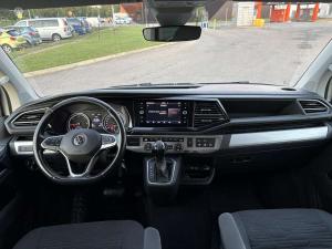 White Volkswagen Multivan 2020 in Panevezys, with an engine capacity of 1.97 L and mileage of 448 thousand km for 21100 €, photo 13 on AUTOMOTO.COM.LV