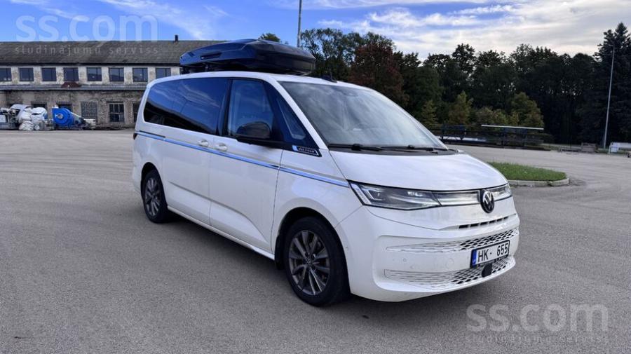 White Volkswagen Multivan 2024 in Riga, with an engine capacity of 2.00 L and mileage of 80 thousand km for 43500 €, photo 3 on AUTOMOTO.COM.LV