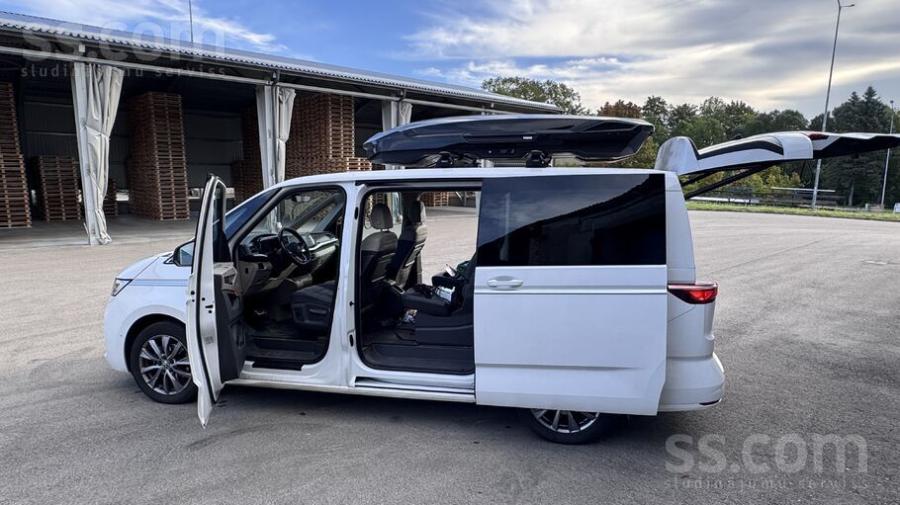 White Volkswagen Multivan 2024 in Riga, with an engine capacity of 2.00 L and mileage of 80 thousand km for 43500 €, photo 7 on AUTOMOTO.COM.LV