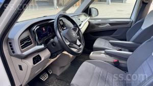 White Volkswagen Multivan 2024 in Riga, with an engine capacity of 2.00 L and mileage of 80 thousand km for 43500 €, photo 12 on AUTOMOTO.COM.LV