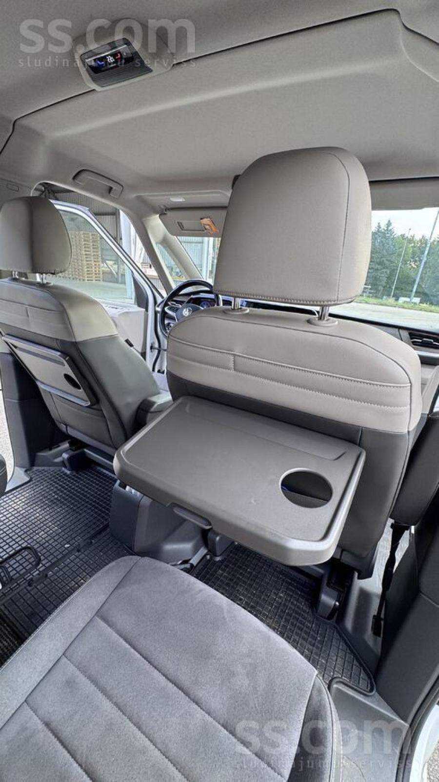 White Volkswagen Multivan 2024 in Riga, with an engine capacity of 2.00 L and mileage of 80 thousand km for 43500 €, photo 18 on AUTOMOTO.COM.LV