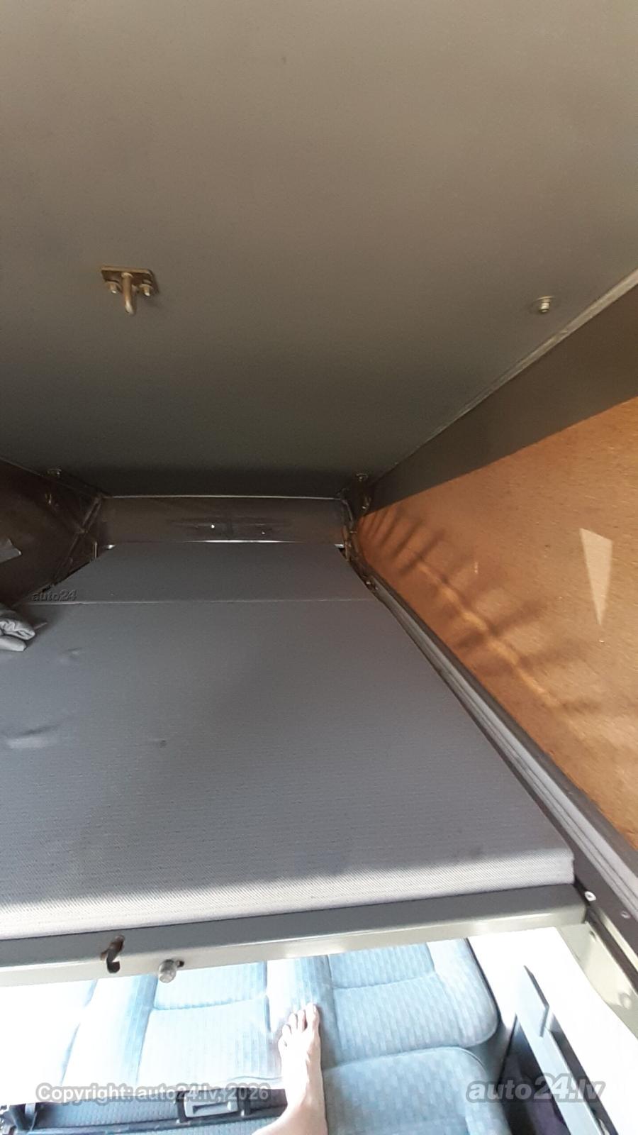 Balts Volkswagen Multivan 1994 Tallina, ar dzinēja tilpumu 2.40 L un nobraukumu 415 tūkst. km par 12800 €, foto 27 vietnē AUTOMOTO.COM.LV