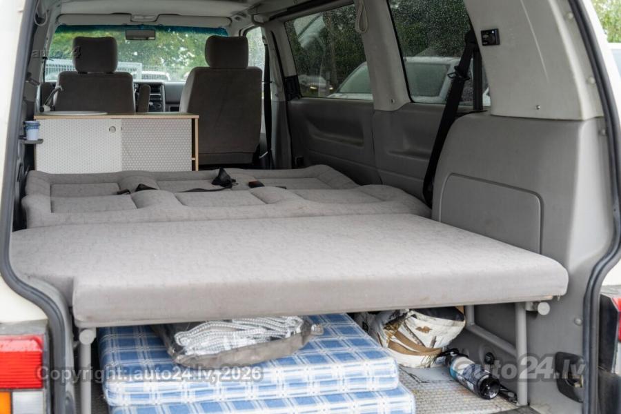 Balts Volkswagen Multivan 1998 Tallina, ar dzinēja tilpumu 1.90 L un nobraukumu 262 tūkst. km par 6500 €, foto 9 vietnē AUTOMOTO.COM.LV