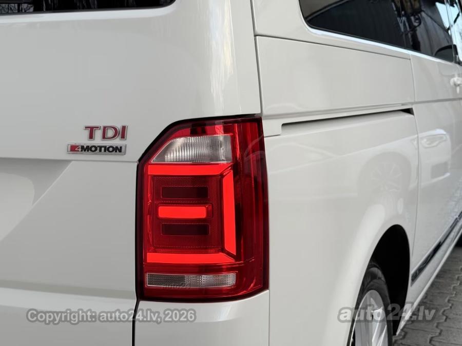 White Volkswagen Multivan 2016 in Tallinn, with an engine capacity of 2.00 L and mileage of 191 thousand km for 29900 €, photo 15 on AUTOMOTO.COM.LV