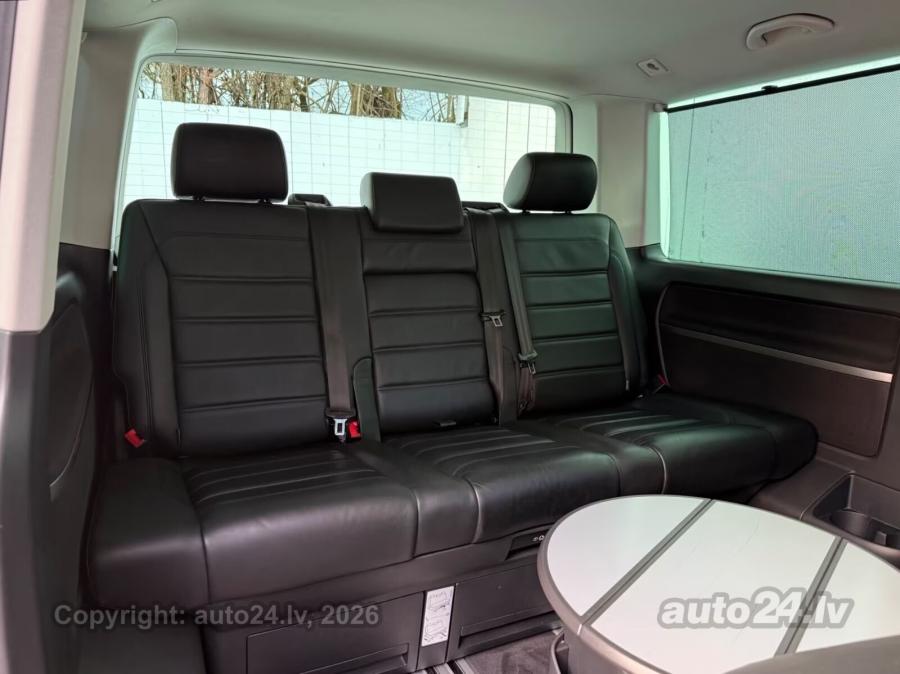 White Volkswagen Multivan 2016 in Tallinn, with an engine capacity of 2.00 L and mileage of 191 thousand km for 29900 €, photo 23 on AUTOMOTO.COM.LV