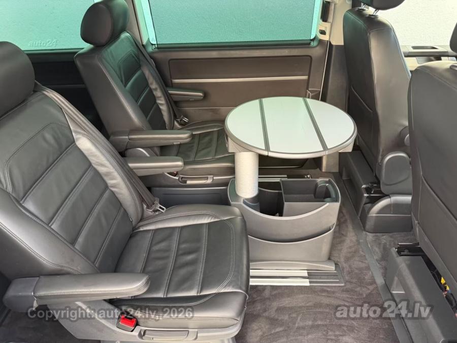 White Volkswagen Multivan 2016 in Tallinn, with an engine capacity of 2.00 L and mileage of 191 thousand km for 29900 €, photo 24 on AUTOMOTO.COM.LV