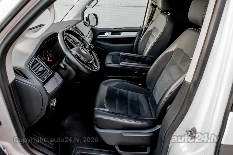 White Volkswagen Multivan 2018 in Parnu, with an engine capacity of 2.00 L and mileage of 149 thousand km for 36900 €, photo 14 on AUTOMOTO.COM.LV