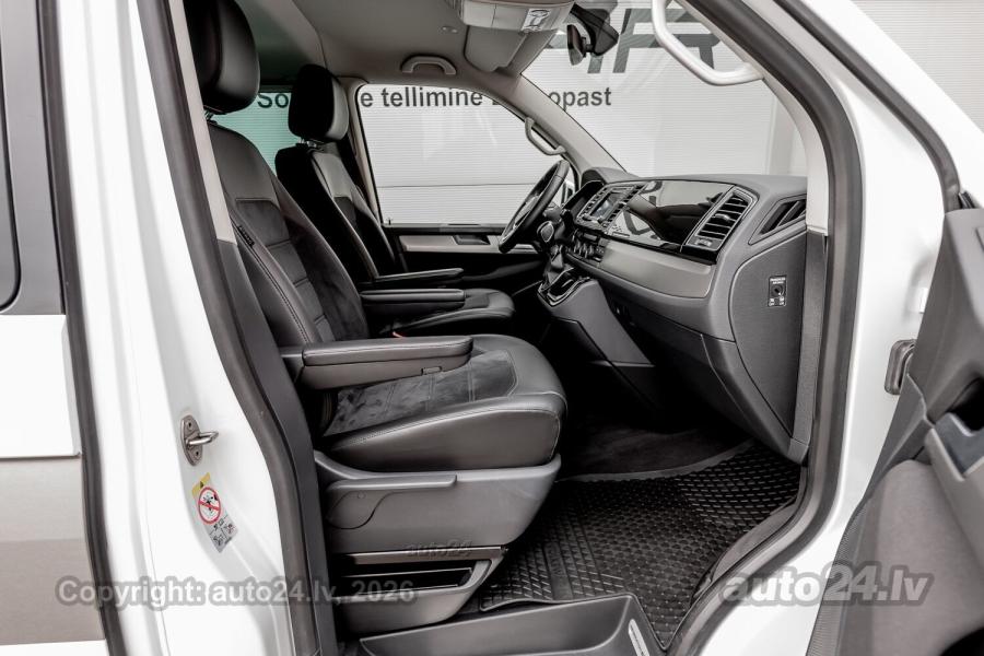 White Volkswagen Multivan 2018 in Parnu, with an engine capacity of 2.00 L and mileage of 170 thousand km for 31900 €, photo 14 on AUTOMOTO.COM.LV
