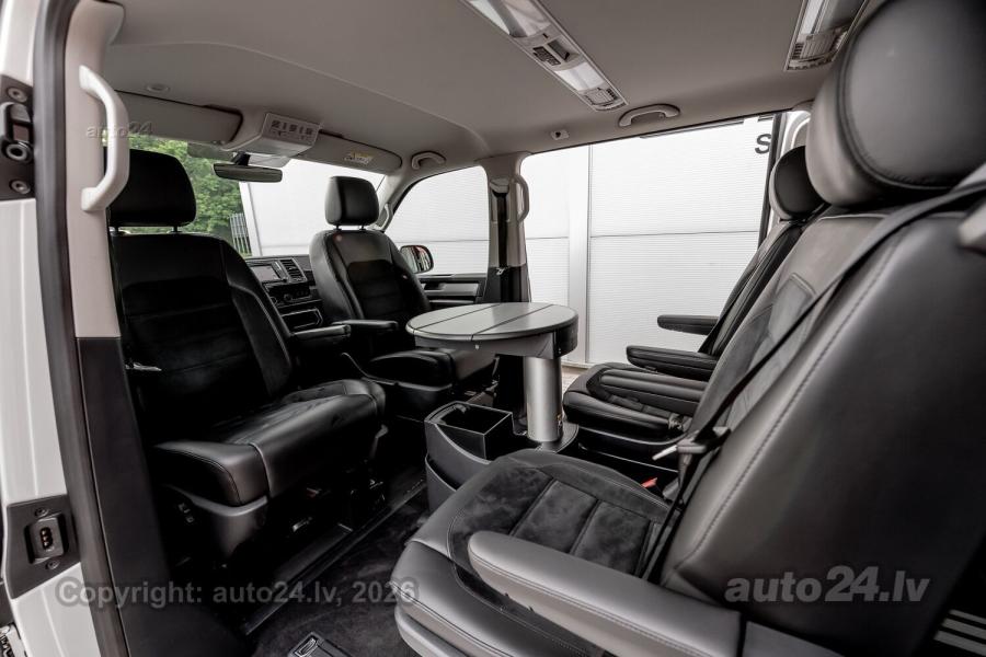 White Volkswagen Multivan 2018 in Parnu, with an engine capacity of 2.00 L and mileage of 170 thousand km for 31900 €, photo 22 on AUTOMOTO.COM.LV