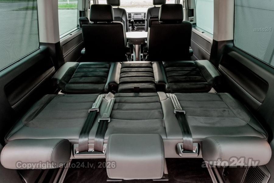 White Volkswagen Multivan 2018 in Parnu, with an engine capacity of 2.00 L and mileage of 170 thousand km for 31900 €, photo 24 on AUTOMOTO.COM.LV