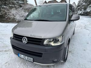 Yellow Volkswagen Multivan 2011 in Vilnius, with an engine capacity of 1.97 L and mileage of 331 thousand km for 14900 €, photo  on AUTOMOTO.COM.LV