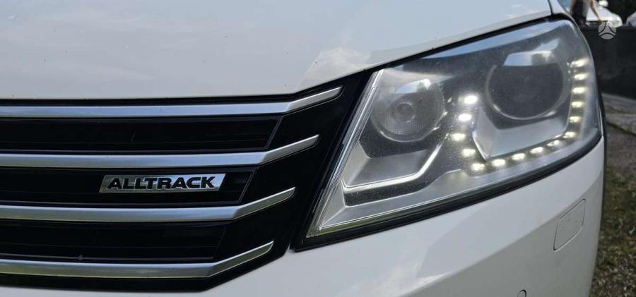 White Volkswagen Passat Alltrack 2014 in Ukmerge, with an engine capacity of 2.00 L and mileage of 262 thousand km for 8100 €, photo 3 on AUTOMOTO.COM.LV
