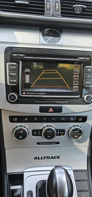 White Volkswagen Passat Alltrack 2014 in Ukmerge, with an engine capacity of 2.00 L and mileage of 262 thousand km for 8100 €, photo 20 on AUTOMOTO.COM.LV