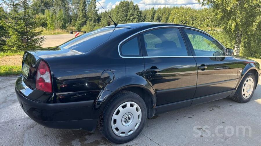 Black Volkswagen Passat B5 2002 in Cesis, with an engine capacity of 2.00 L and mileage of 217 thousand km for 1200 €, photo 12 on AUTOMOTO.COM.LV