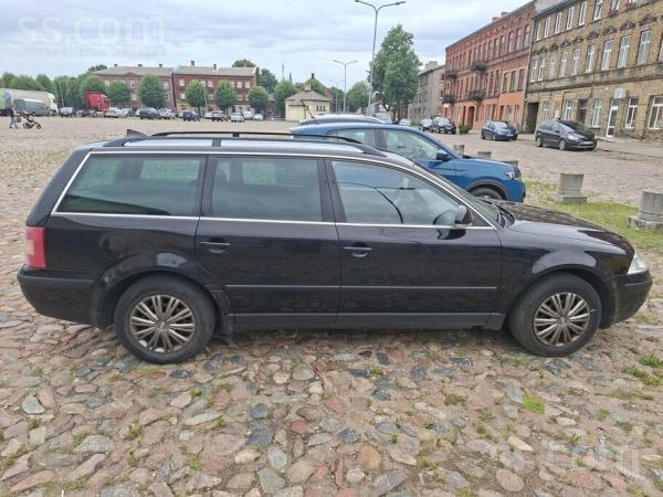 Melns Volkswagen Passat B5 2004 Liepāja, ar dzinēja tilpumu 1.60 L un nobraukumu 234 tūkst. km par 1250 €, foto 2 vietnē AUTOMOTO.COM.LV