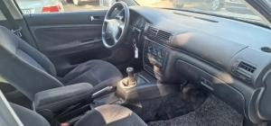 Grey Volkswagen Passat B5 1997 in Valmiera, with an engine capacity of 1.80 L and mileage of 257 thousand km for 1100 €, photo 12 on AUTOMOTO.COM.LV
