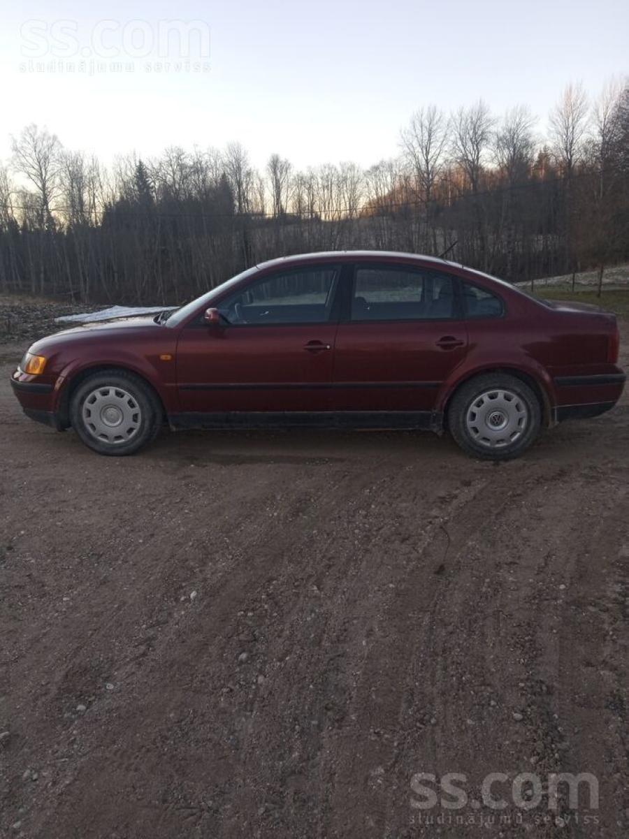 Red Volkswagen Passat B5 1997 in Madona, with an engine capacity of 1.60 L and mileage of 183 thousand km for 900 €, photo 2 on AUTOMOTO.COM.LV