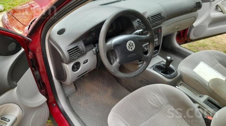 Red Volkswagen Passat B5 1998 in Riga, with an engine capacity of 1.80 L and mileage of 348 thousand km for 1400 €, photo 4 on AUTOMOTO.COM.LV