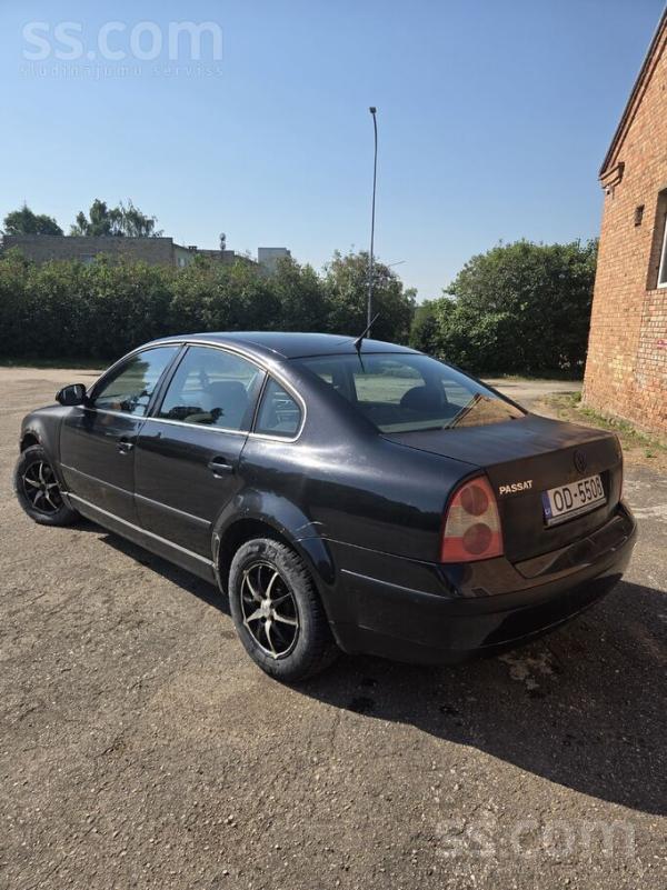 Black Volkswagen Passat B6 2004 in Bauska, with an engine capacity of 1.90 L and mileage of 351 thousand km for 400 €, photo 6 on AUTOMOTO.COM.LV