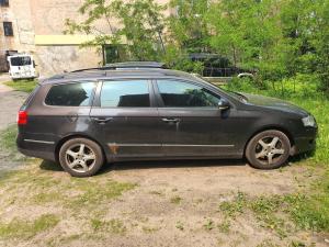 Black Volkswagen Passat B6 2009 in Riga, with an engine capacity of 1.90 L and mileage of 350 thousand km for 1500 €, photo 5 on AUTOMOTO.COM.LV