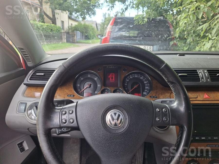 Red Volkswagen Passat B6 2006 in Riga, with an engine capacity of 2.00 L and mileage of 302 thousand km for 1500 €, photo 15 on AUTOMOTO.COM.LV