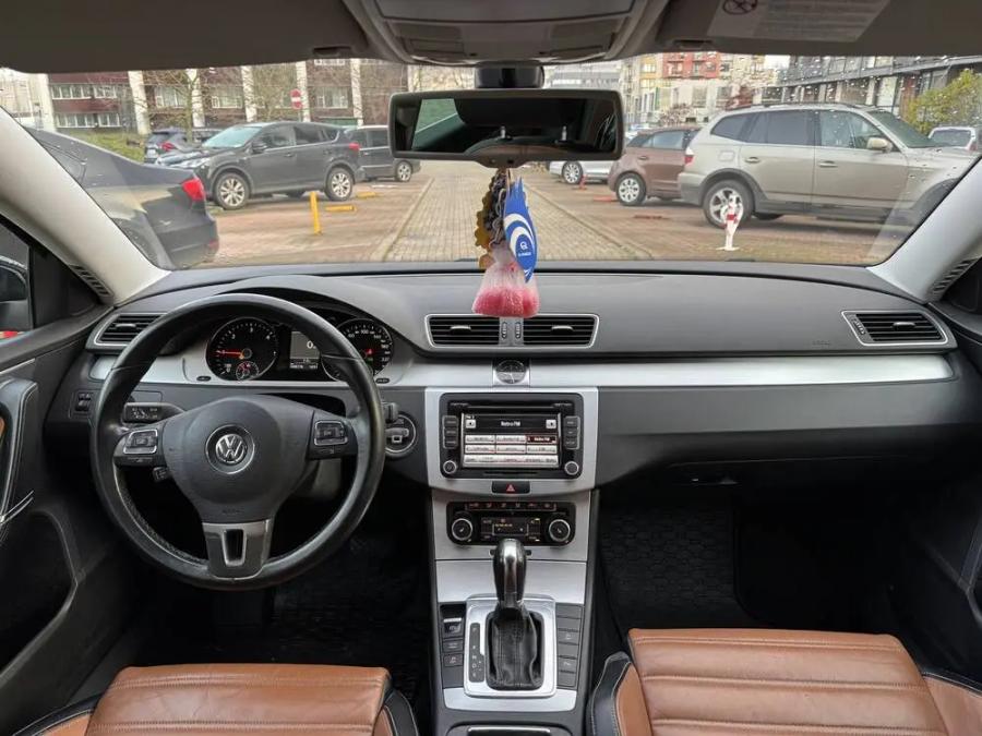 Black Volkswagen Passat B7 2011 in Riga, with an engine capacity of 2.00 L and mileage of 349 thousand km for 4390 €, photo 15 on AUTOMOTO.COM.LV