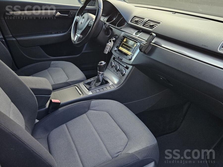 Black Volkswagen Passat B7 2012 in Jekabpils, with an engine capacity of 2.00 L and mileage of 312 thousand km for 5990 €, photo 23 on AUTOMOTO.COM.LV