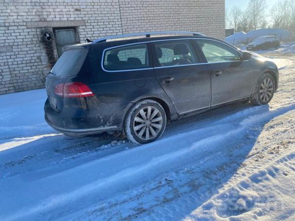 Melns Volkswagen Passat B7 2013 Ogre, ar dzinēja tilpumu 2.00 L un nobraukumu 276 tūkst. km par 2150 €, foto 5 vietnē AUTOMOTO.COM.LV
