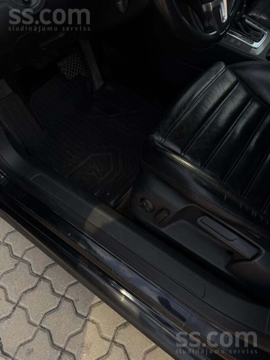 Black Volkswagen Passat B7 2013 in Riga, with an engine capacity of 1.60 L and mileage of 426 thousand km for 3497 €, photo 18 on AUTOMOTO.COM.LV