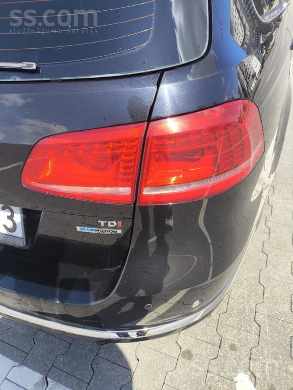 Black Volkswagen Passat B7 2014 in Riga, with an engine capacity of 1.60 L and mileage of 255 thousand km for 6000 €, photo 5 on AUTOMOTO.COM.LV