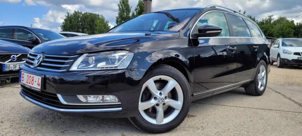 Black Volkswagen Passat B7 2014 in Riga, with an engine capacity of 2.00 L and mileage of 215 thousand km for 8900 €, photo 2 on AUTOMOTO.COM.LV