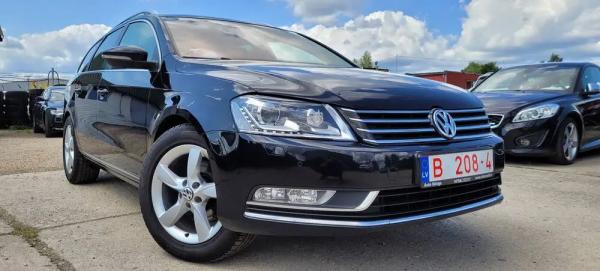 Black Volkswagen Passat B7 2014 in Riga, with an engine capacity of 2.00 L and mileage of 215 thousand km for 8900 €, photo 7 on AUTOMOTO.COM.LV