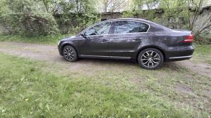 Brown Volkswagen Passat B7 2011 in Riga, with an engine capacity of 2.00 L and mileage of 320 thousand km for 5200 €, photo 6 on AUTOMOTO.COM.LV