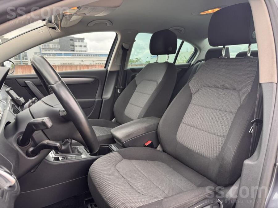 Grey Volkswagen Passat B7 2014 in Riga, with an engine capacity of 1.40 L and mileage of 212 thousand km for 4995 €, photo 12 on AUTOMOTO.COM.LV