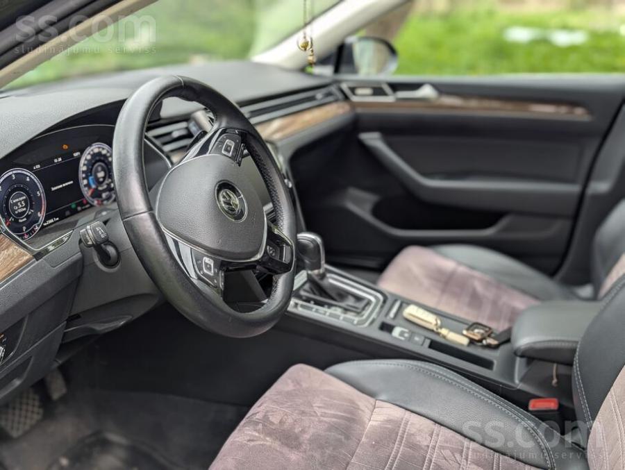 Black Volkswagen Passat B8 2015 in Riga, with an engine capacity of 1.60 L and mileage of 261 thousand km for 9900 €, photo 13 on AUTOMOTO.COM.LV