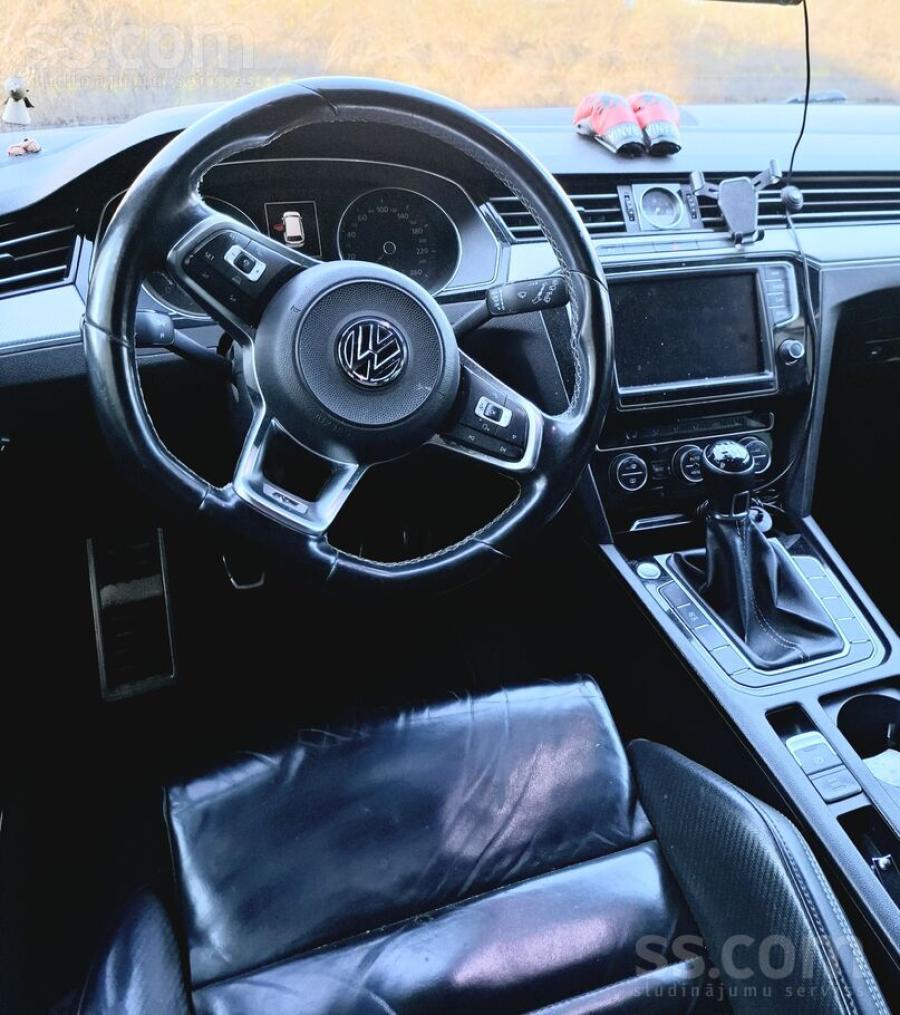 White Volkswagen Passat B8 2016 in Riga, with an engine capacity of 2.00 L and mileage of 298 thousand km for 8001 €, photo 13 on AUTOMOTO.COM.LV