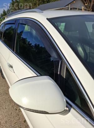 White Volkswagen Passat B8 2016 in Riga, with an engine capacity of 2.00 L and mileage of 298 thousand km for 8001 €, photo 14 on AUTOMOTO.COM.LV