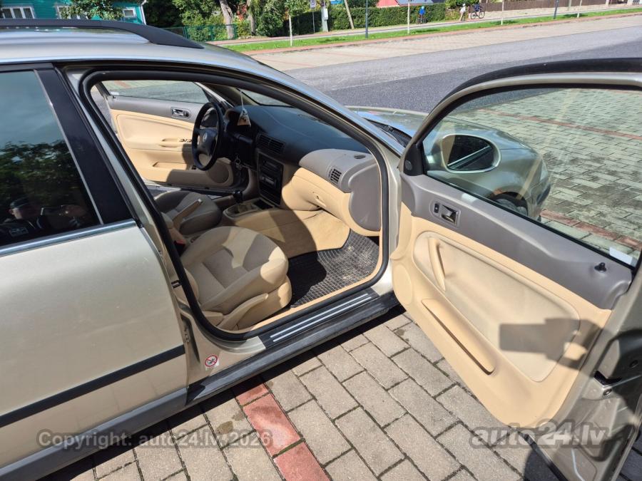 Beige Volkswagen Passat 2004 in Rakvere, with an engine capacity of 2.00 L and mileage of 205 thousand km for 1690 €, photo 13 on AUTOMOTO.COM.LV